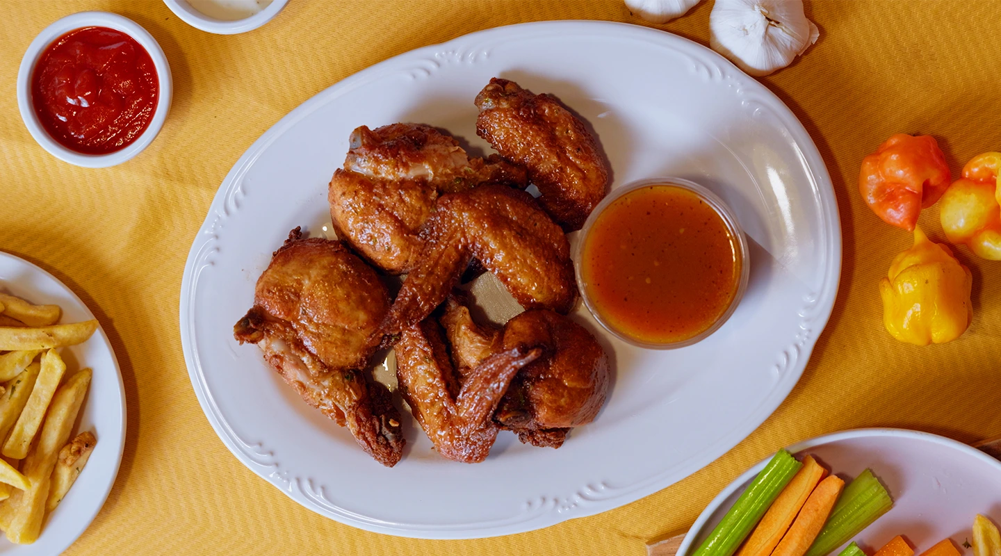 Alitas picantes en salsa de mango - Pollo Rico